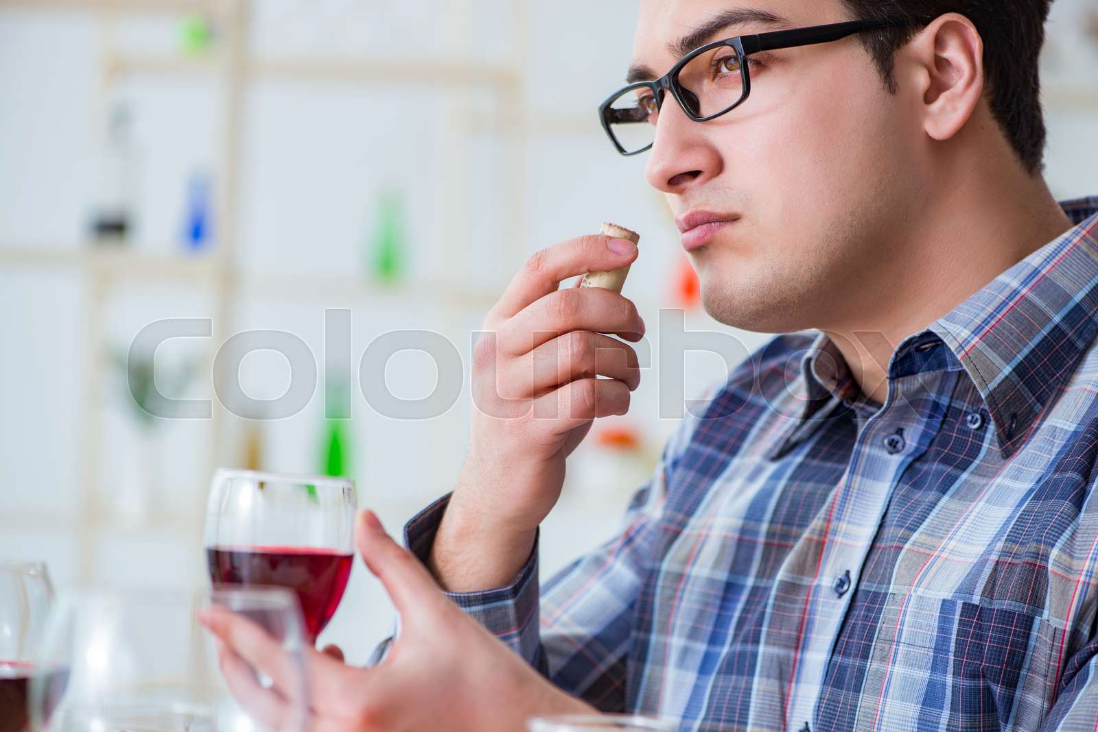 Professional sommelier tasting red wine | Stock image | Colourbox