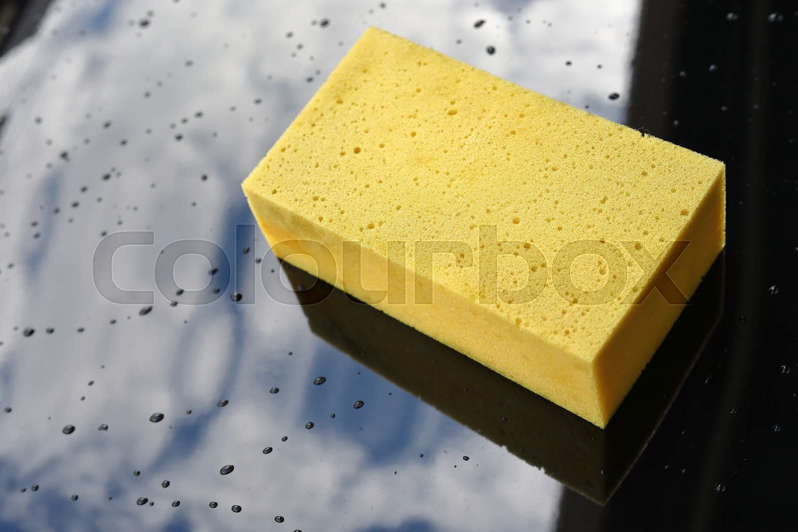 yellow sponge used car wash | Stock image | Colourbox