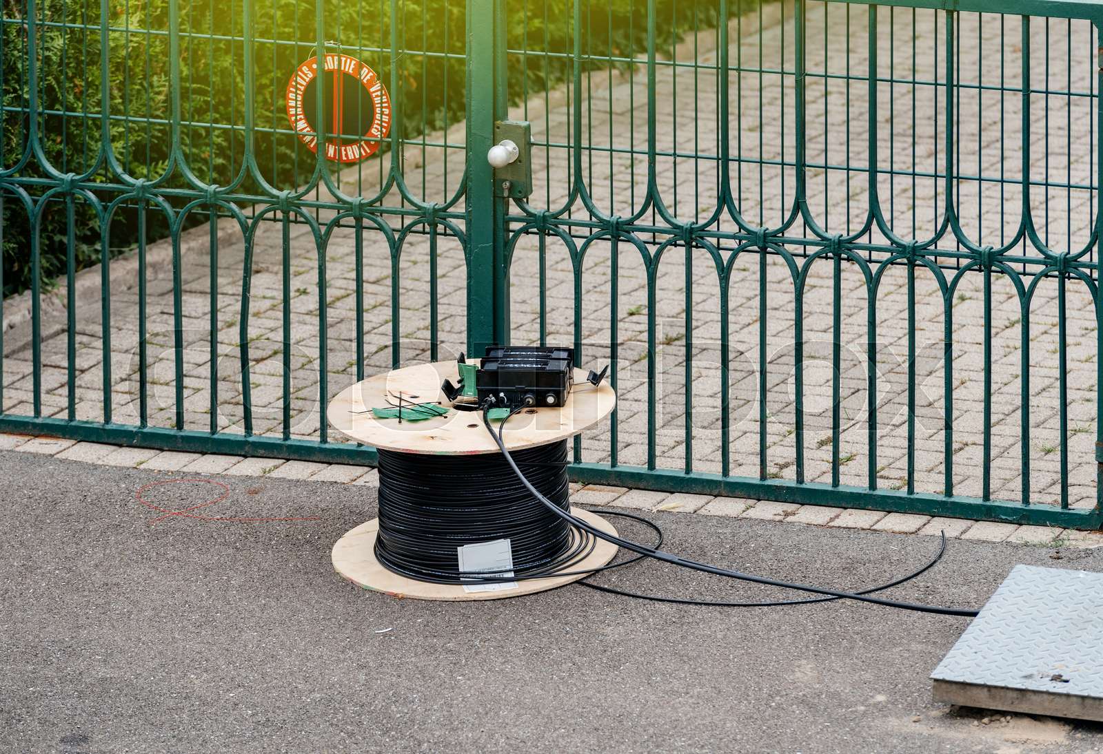 Optic fiber cable on coil spool | Stock image | Colourbox