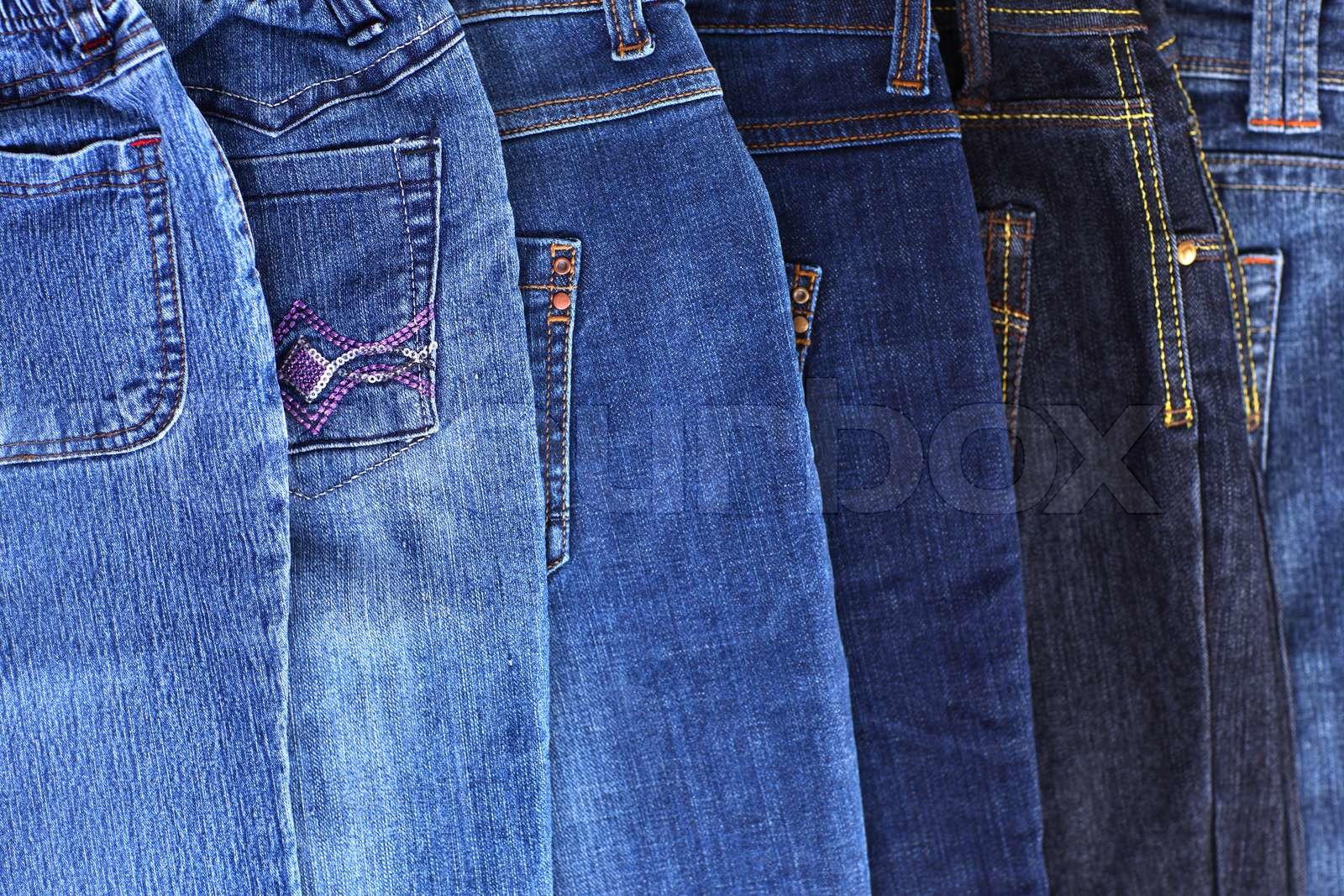 Stack of different jeans - detail | Stock image | Colourbox