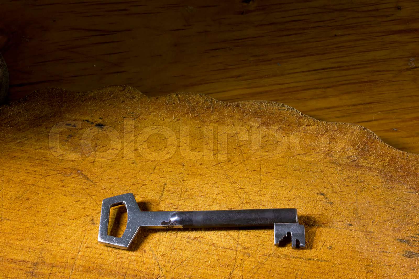 Old key on the table | Stock image | Colourbox
