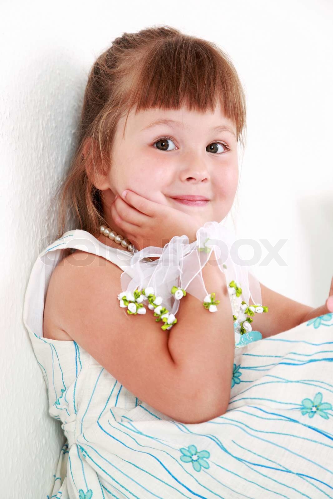 Portrait of beautiful small girl smiling | Stock image | Colourbox