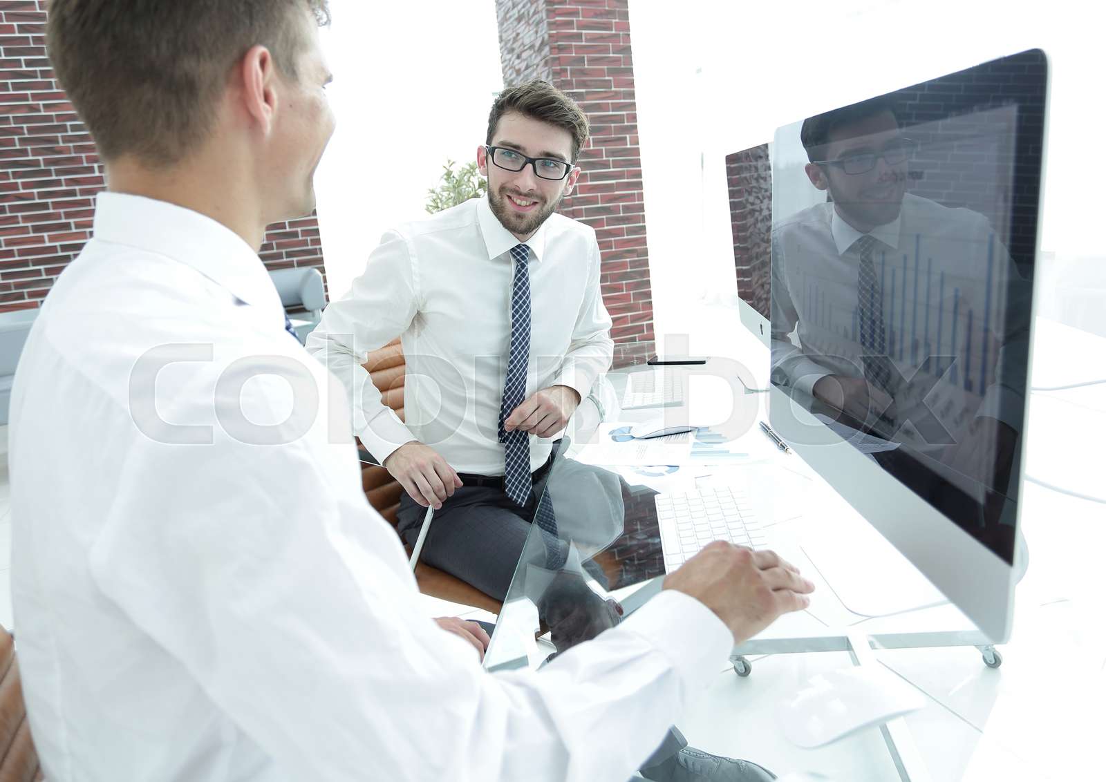 company's employees at the workplace | Stock image | Colourbox