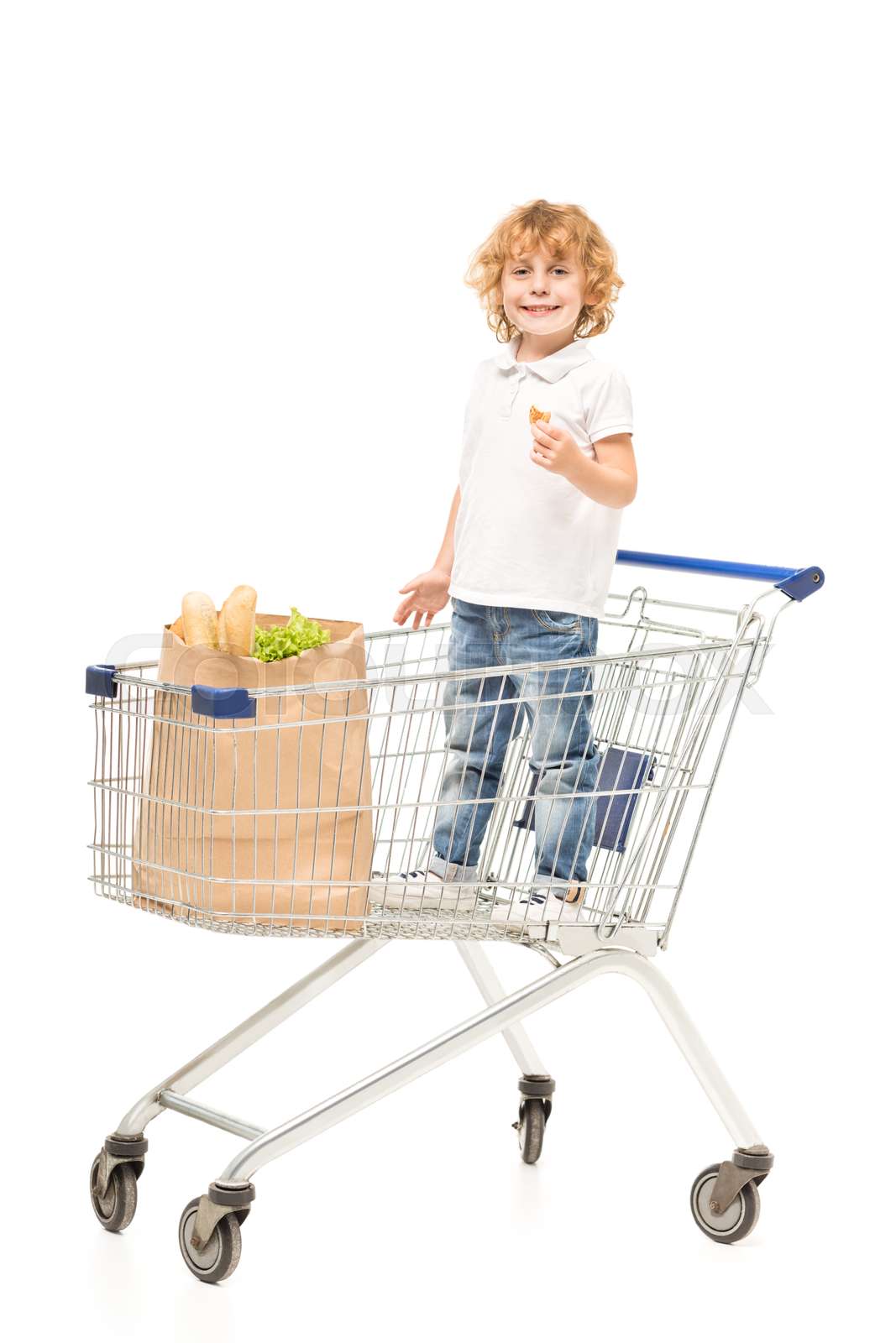 kid in shopping cart | Stock image | Colourbox