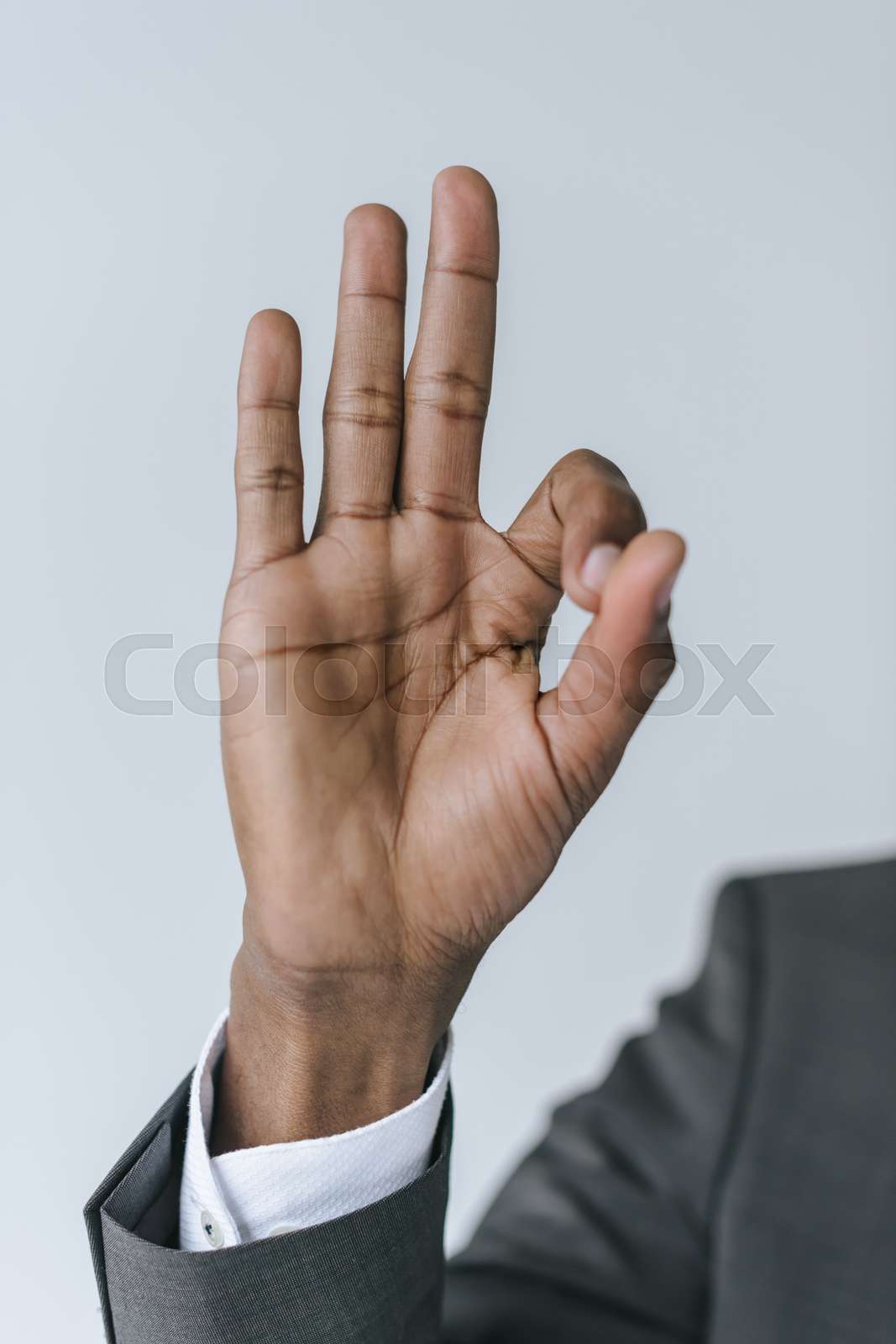 african american businessman showing ok sign | Stock image | Colourbox