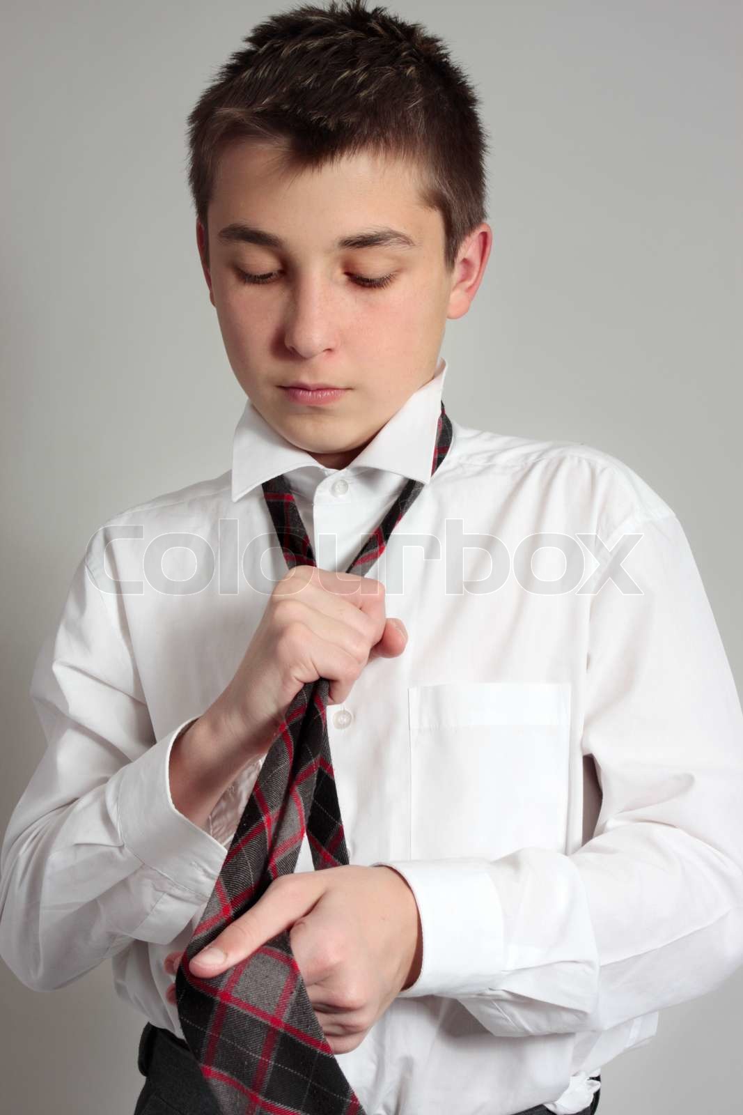 Boy getting ready for school | Stock image | Colourbox