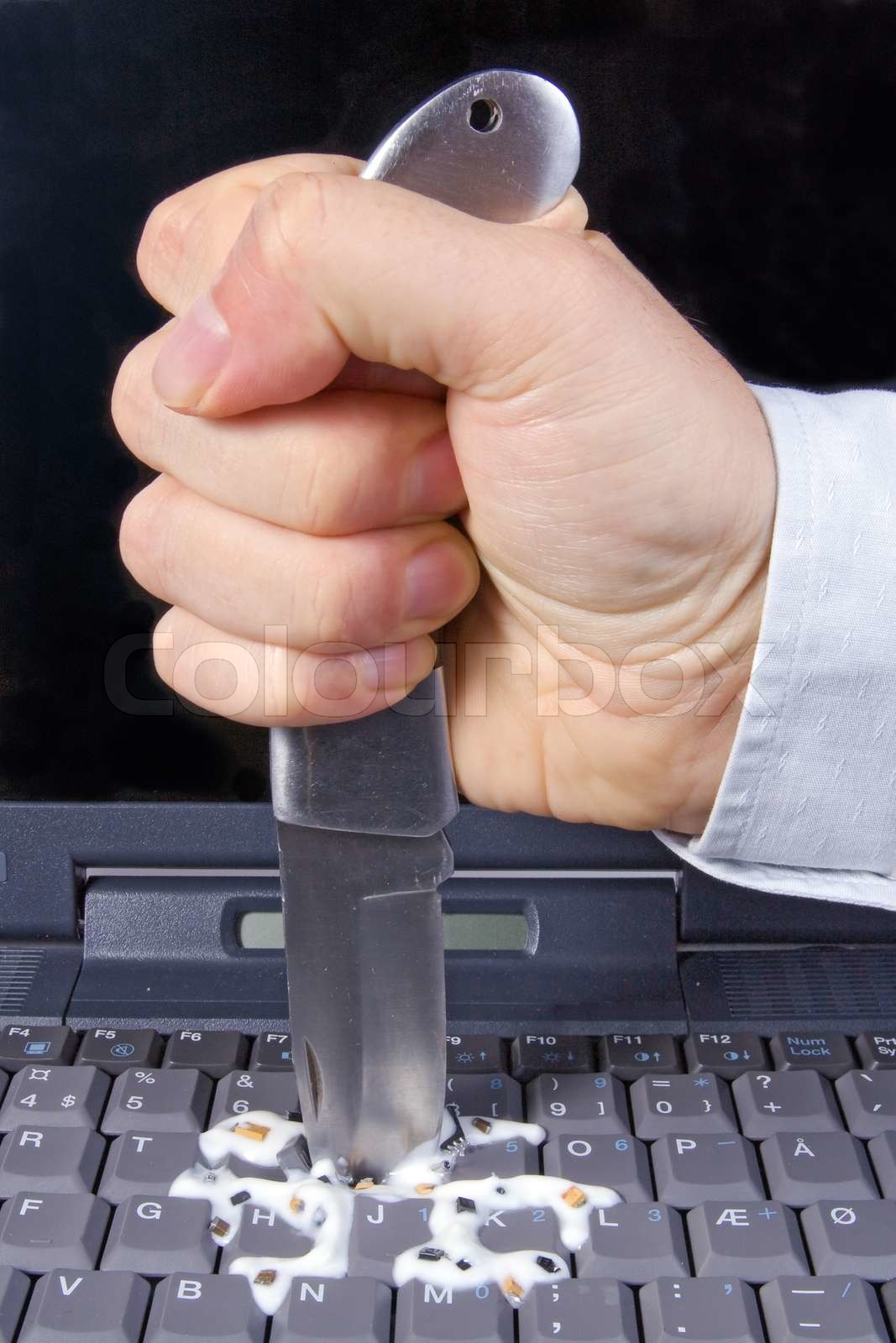 Stab in the keyboard | Stock image | Colourbox