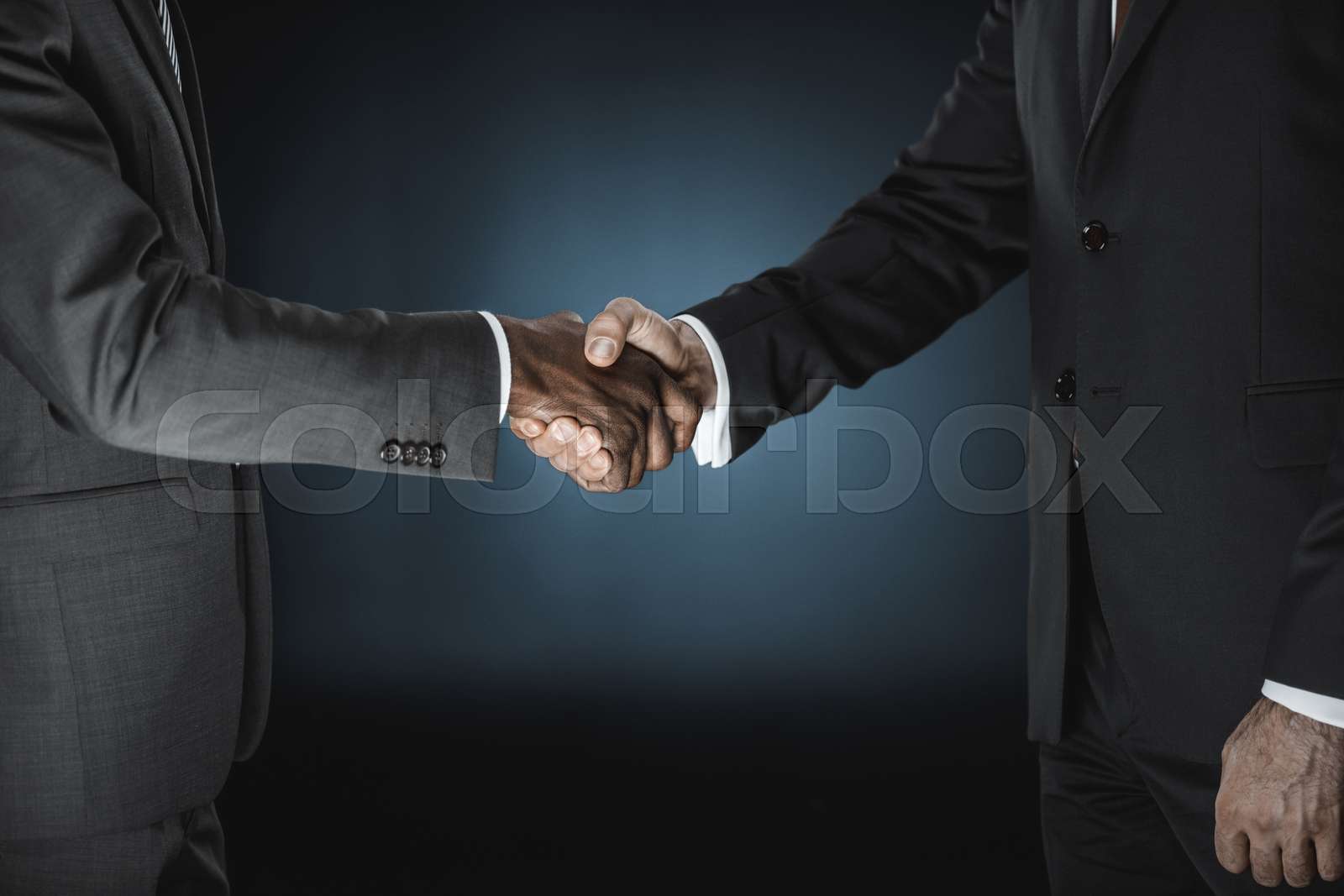 multicultural businessmen handshake | Stock image | Colourbox multicultural businessmen handshake | Stock image | Colourbox