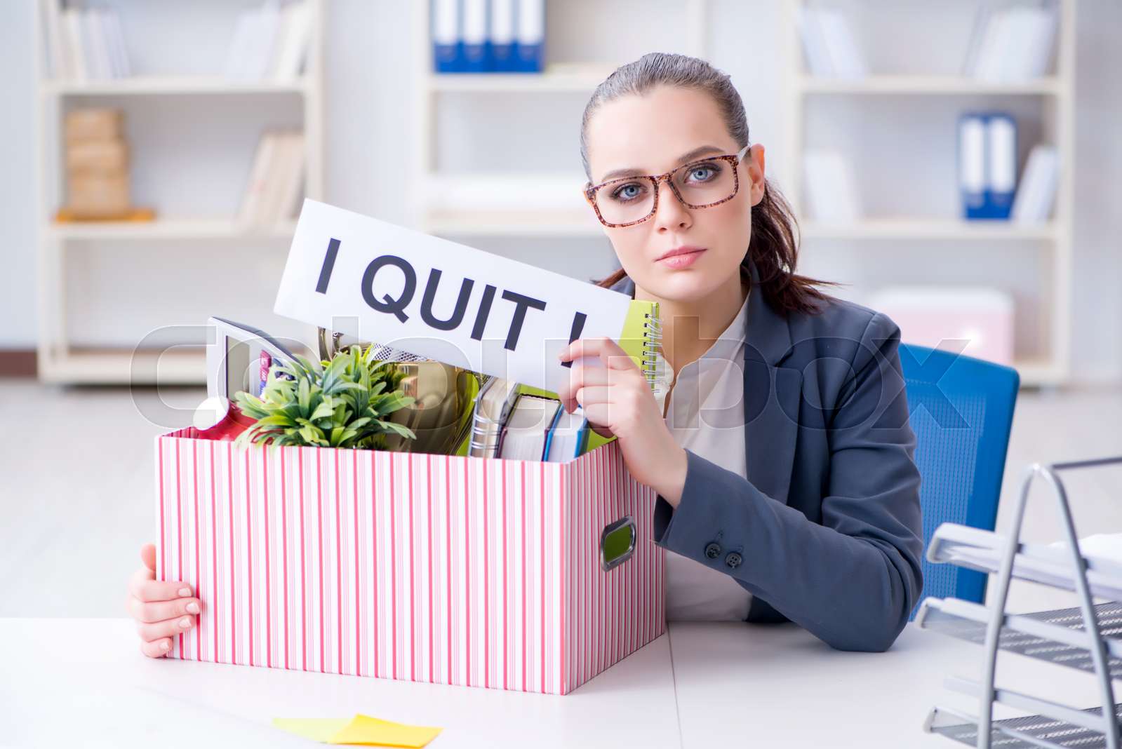 Businesswoman resigning from her job | Stock image | Colourbox