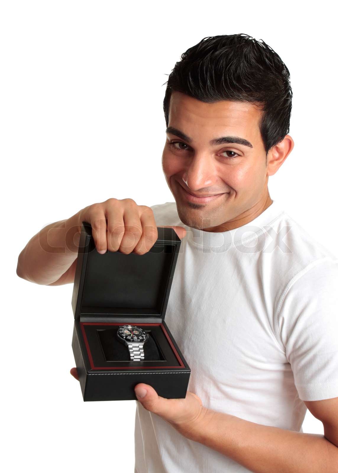 A friendly man or salesman holds a watch timepiece displayed in a box ...