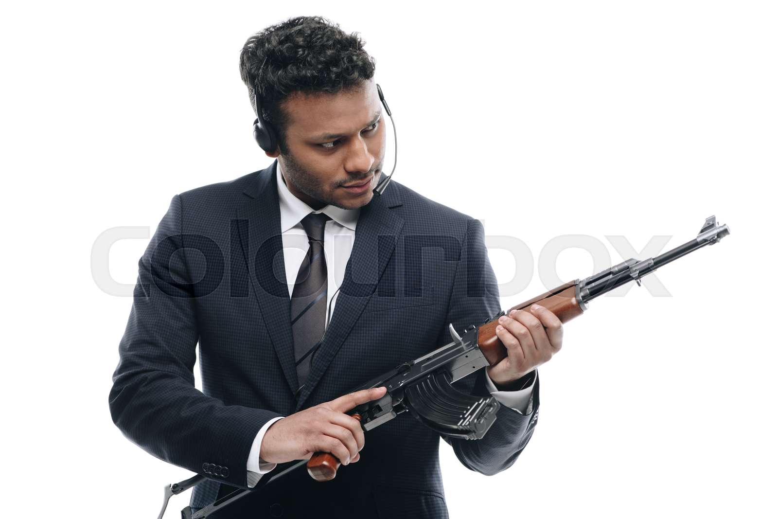 african american bodyguard with rifle | Stock image | Colourbox