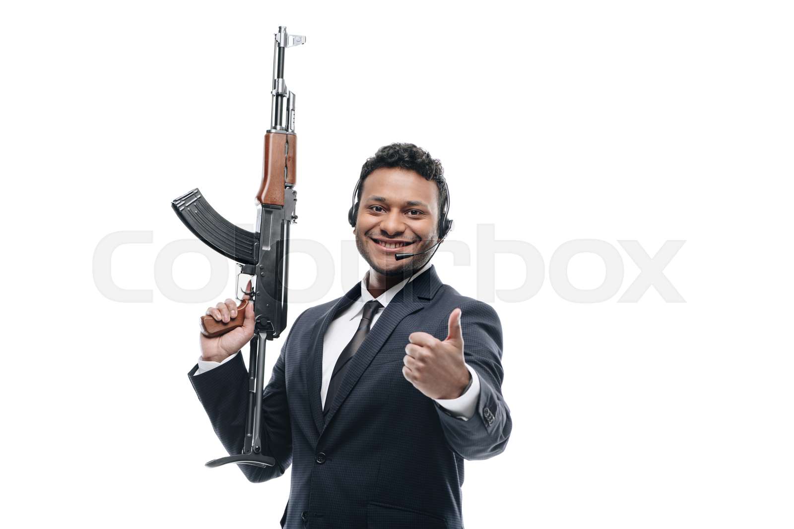 afro bodyguard with thumb up | Stock image | Colourbox