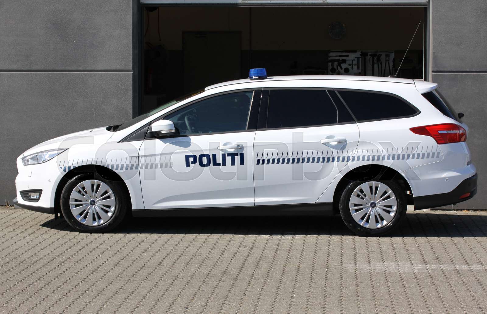 Dansk Politibil med blåt blink | Stock foto | Colourbox