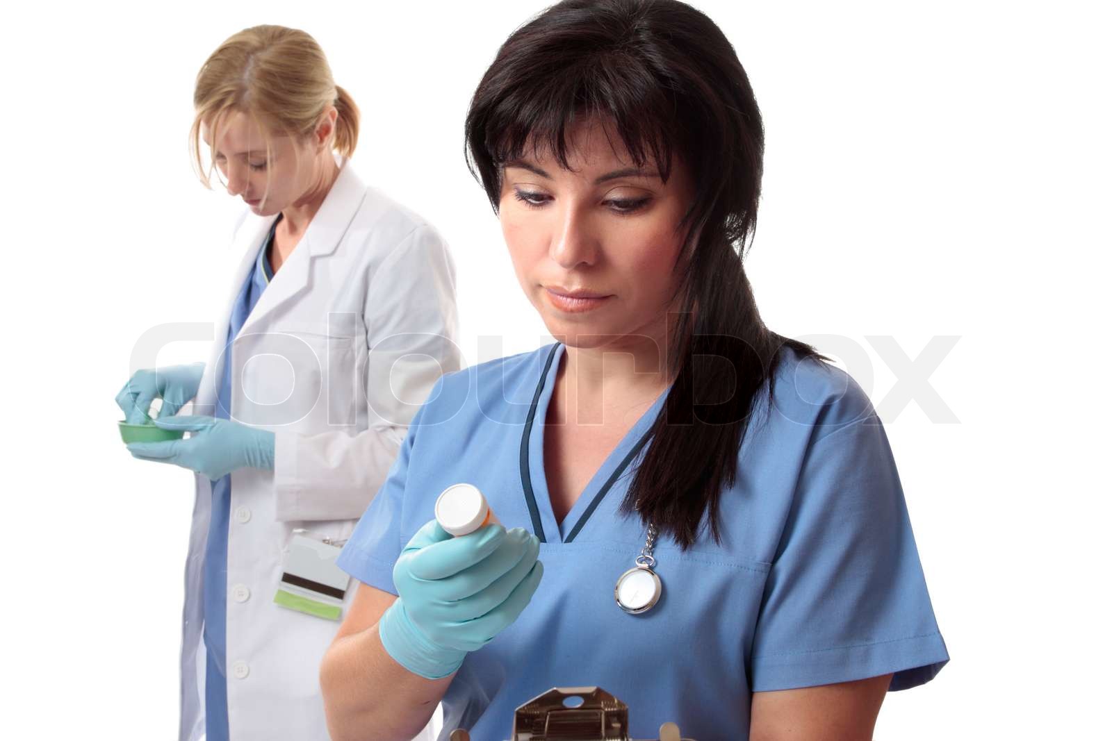 Doctors or nurses daily occupationduties at work | Stock image | Colourbox