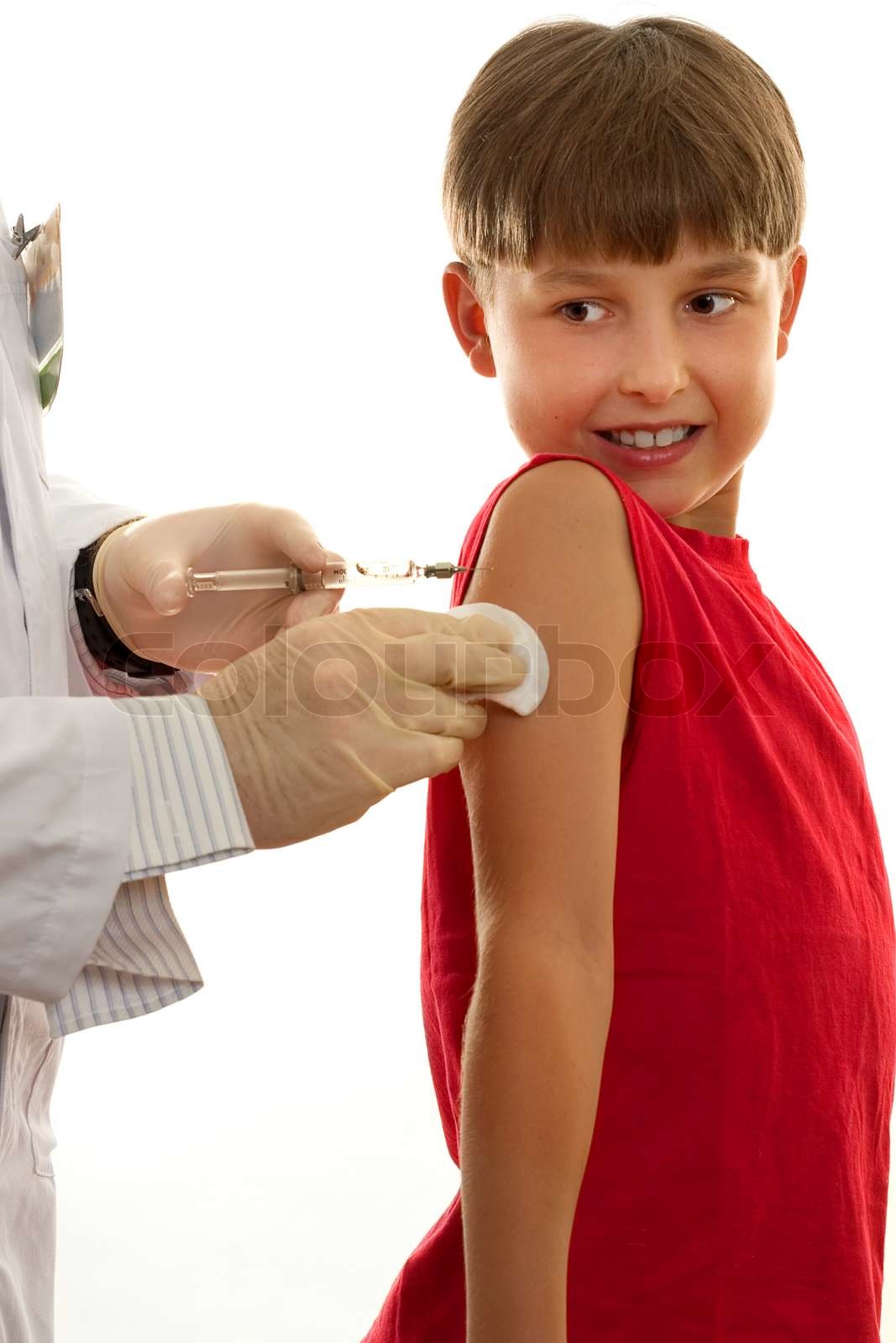 A doctor immunising a child between 5-12yrs Immunisation is a way of ...