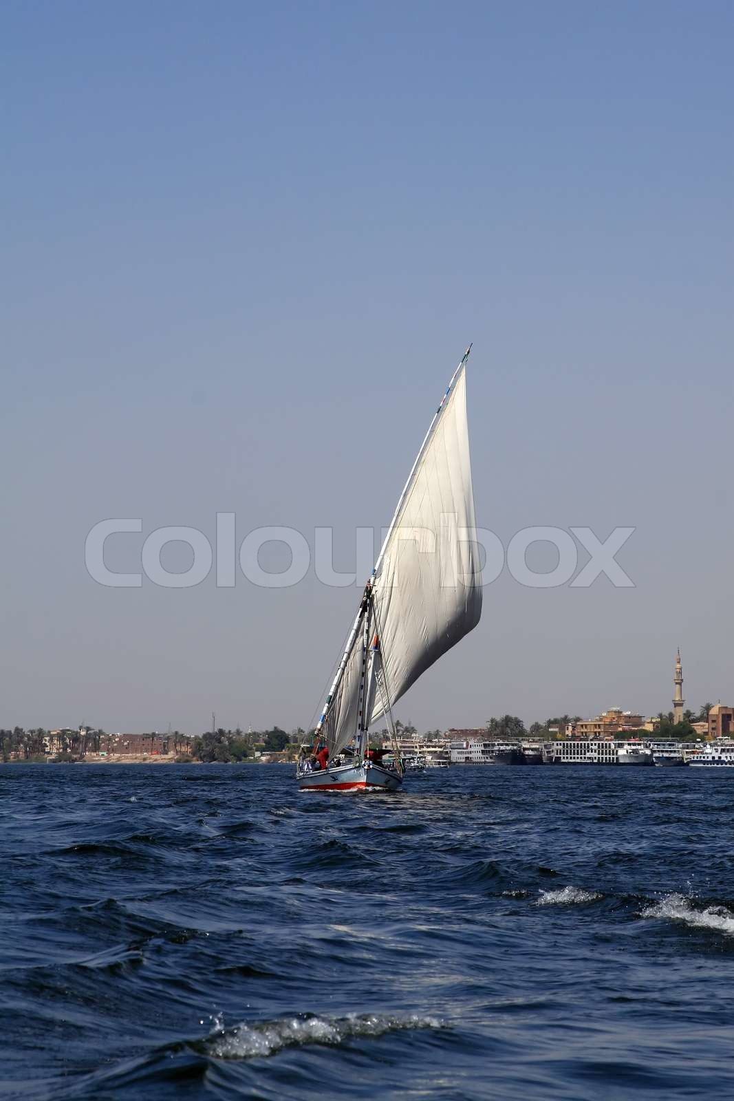 Traditional egyptian feluka on the Nile | Stock image | Colourbox