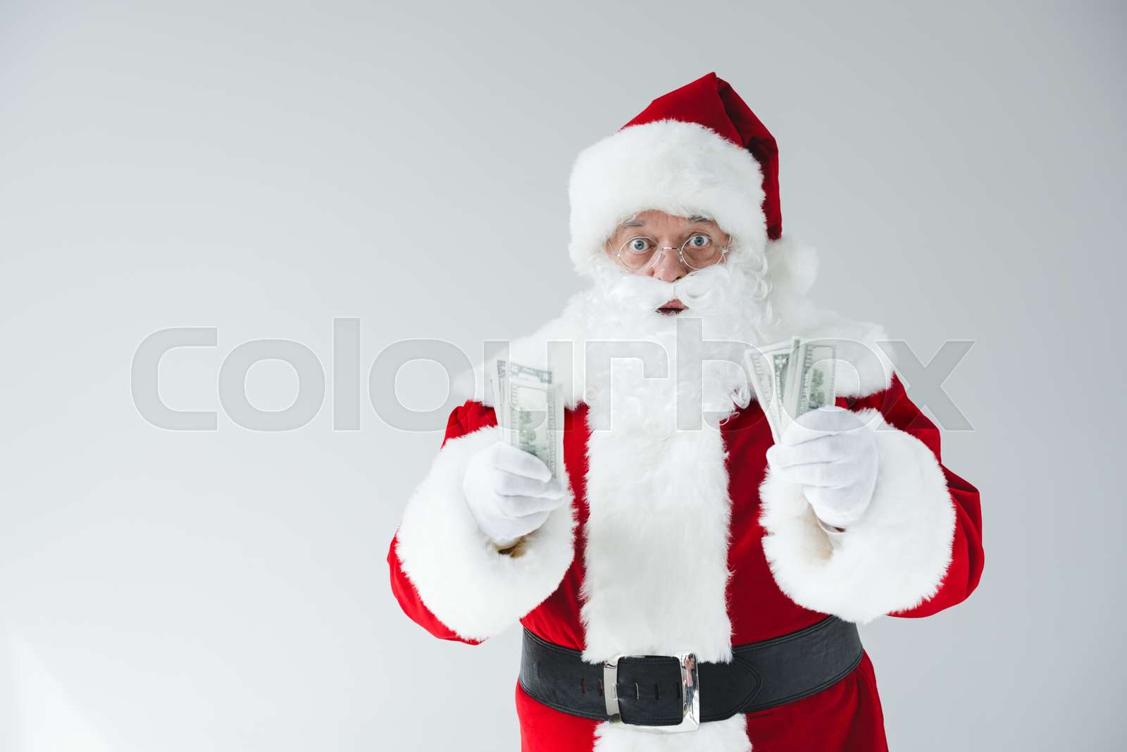 santa with dollar banknotes | Stock image | Colourbox