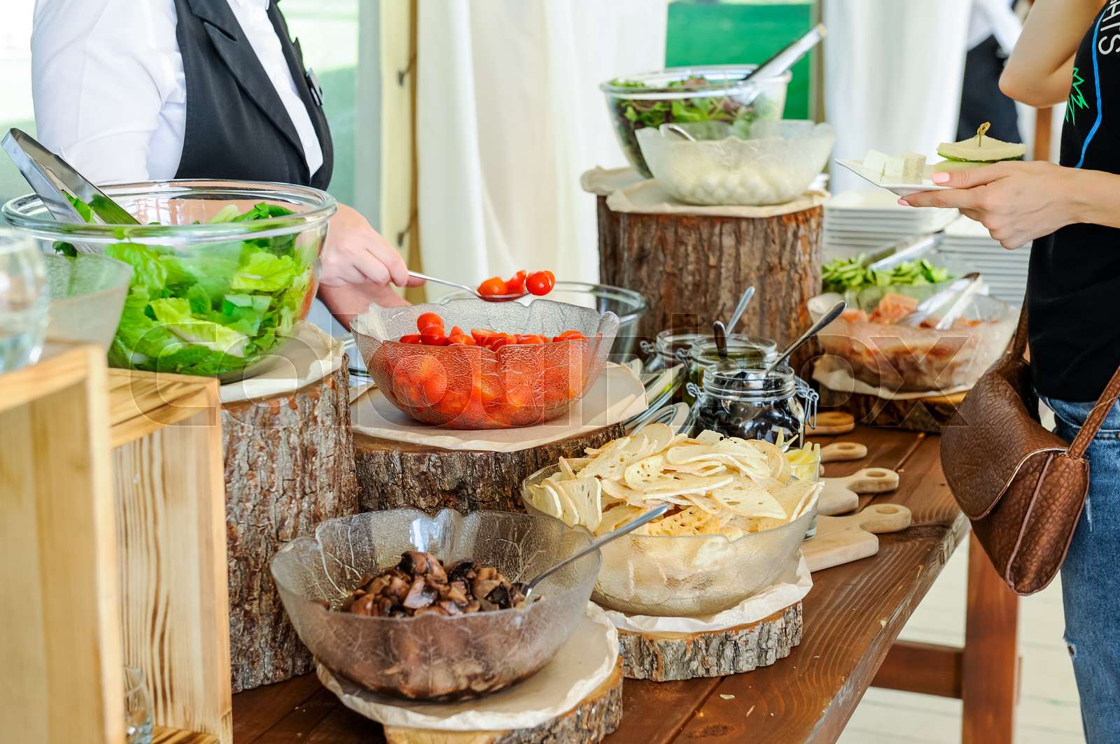 Outdoor Cuisine Culinary salad bar Catering. Group of people in all you ...