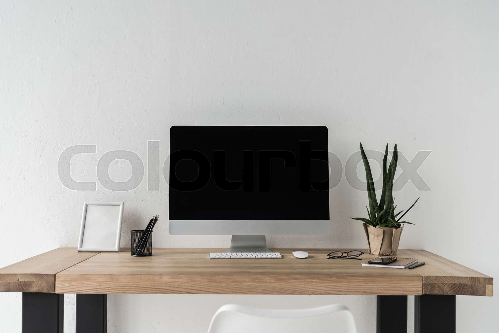 workplace with computer in modern office | Stock image | Colourbox