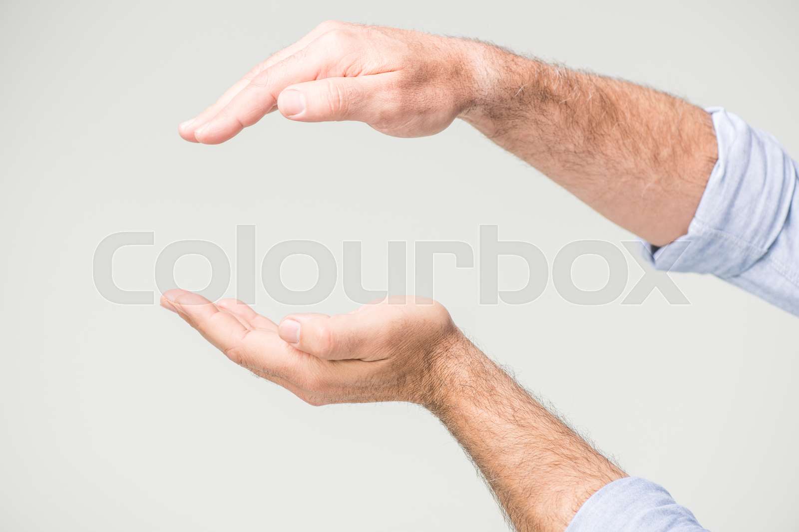 man showing frame | Stock image | Colourbox