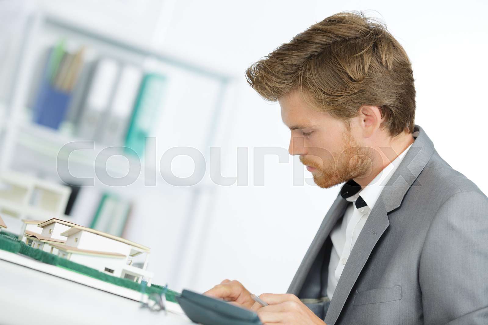 executive construction entrepreneur designing new housing project ...