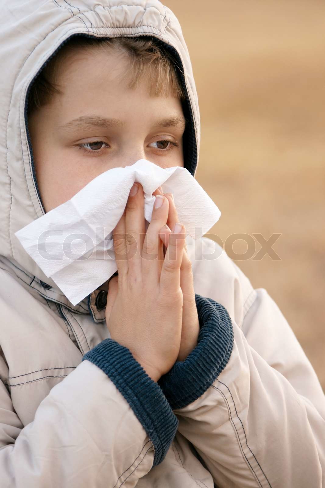 Child feeling sick with the flu or hayfever | Stock image | Colourbox