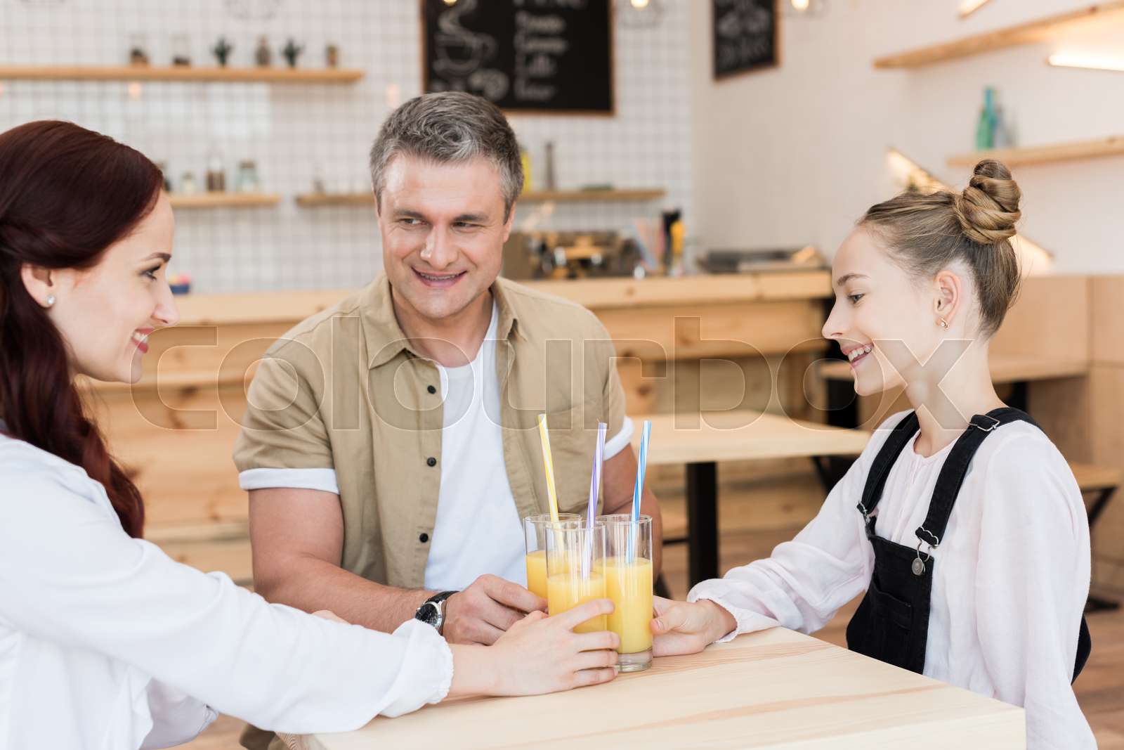 beautiful family in cafe | Stock image | Colourbox