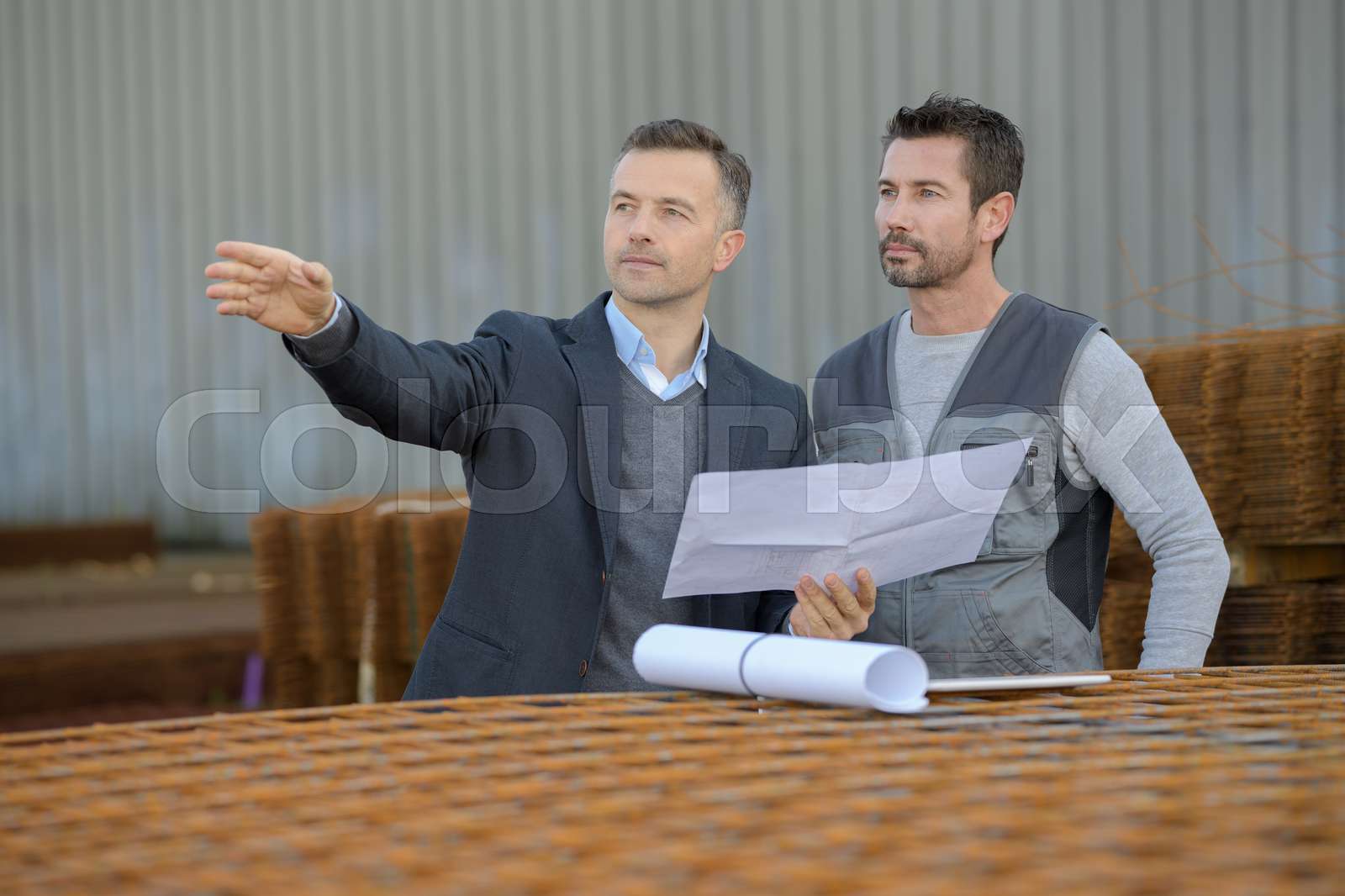 foreman overseeing construction | Stock image | Colourbox