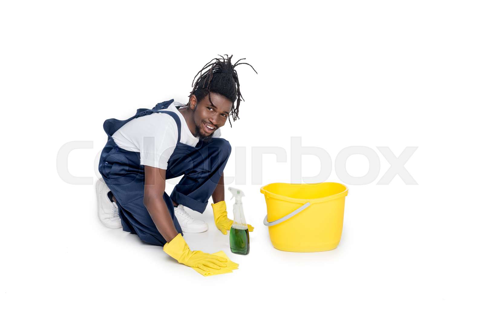 african american cleaner washing floor | Stock image | Colourbox