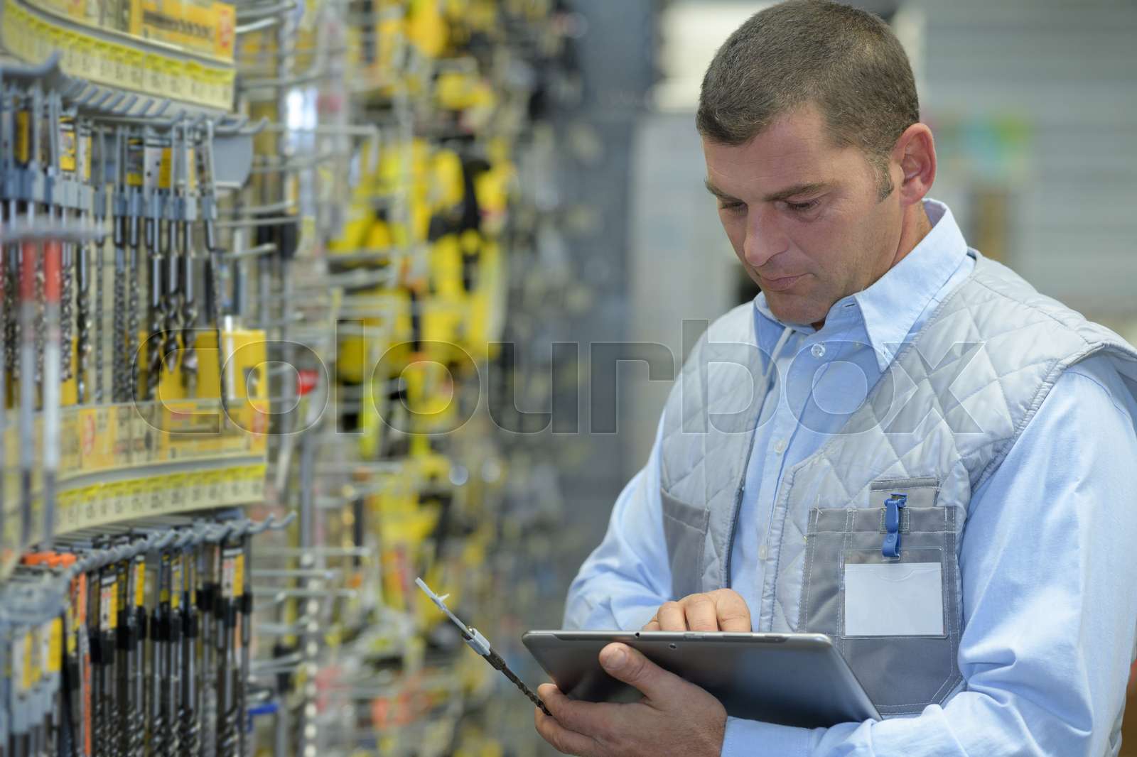 hardware store salesman worker | Stock image | Colourbox