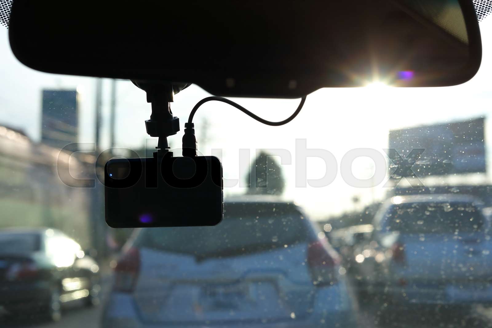 black video camera record technology on windscreen vehicle car driving ...