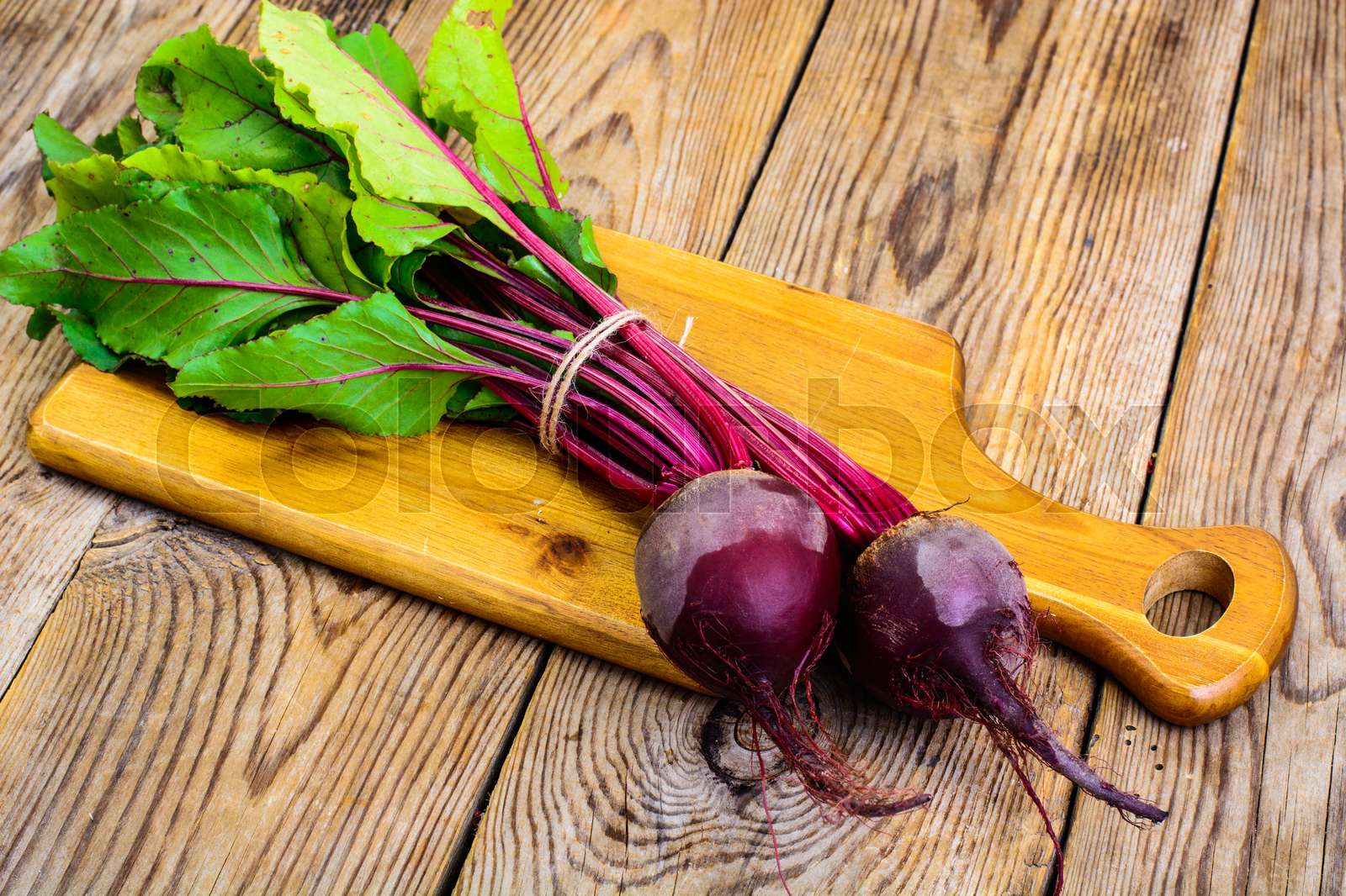 Fresh raw beetroot, sliced on kitchen cutting board | Stock image ...