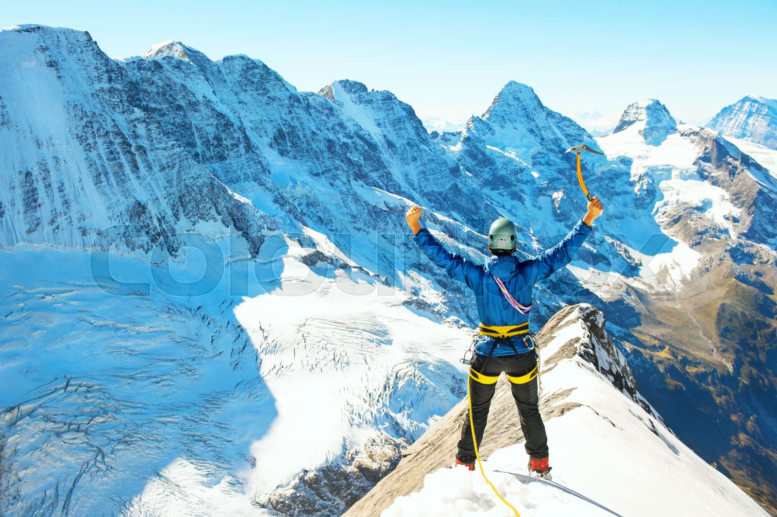 Group of climbers reaching the summit | Stock image | Colourbox