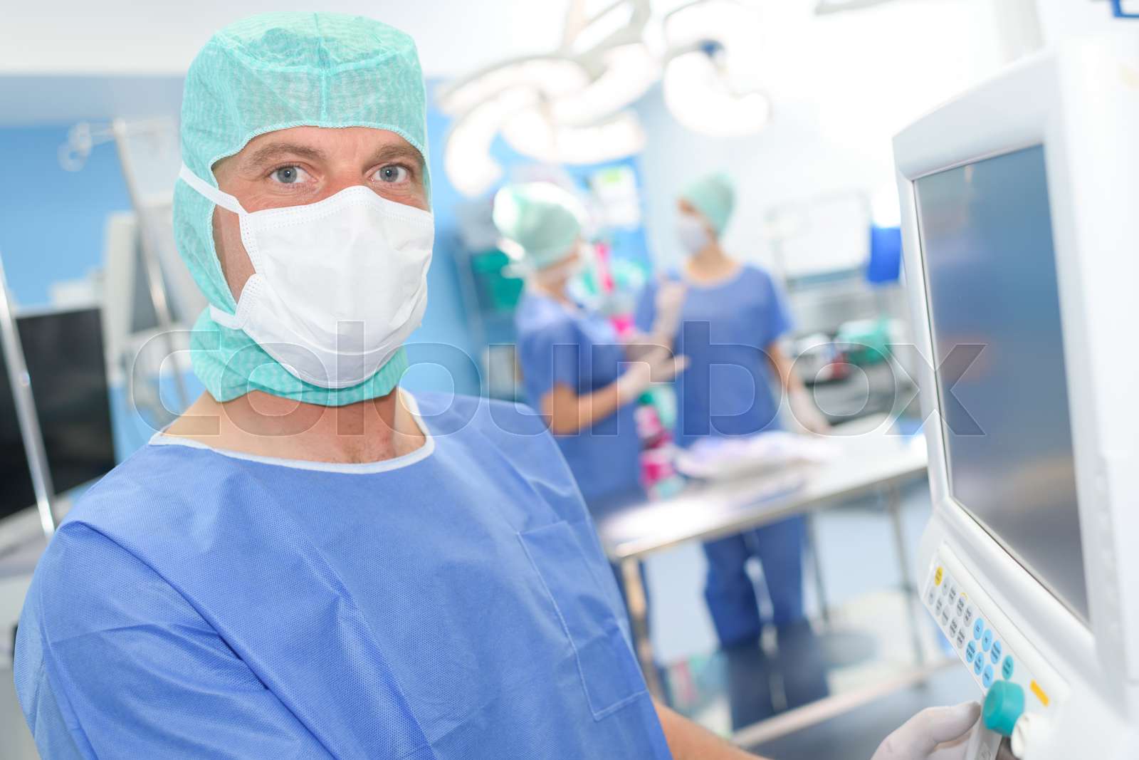 portrait of surgeon standing in operation room at the hospital | Stock ...