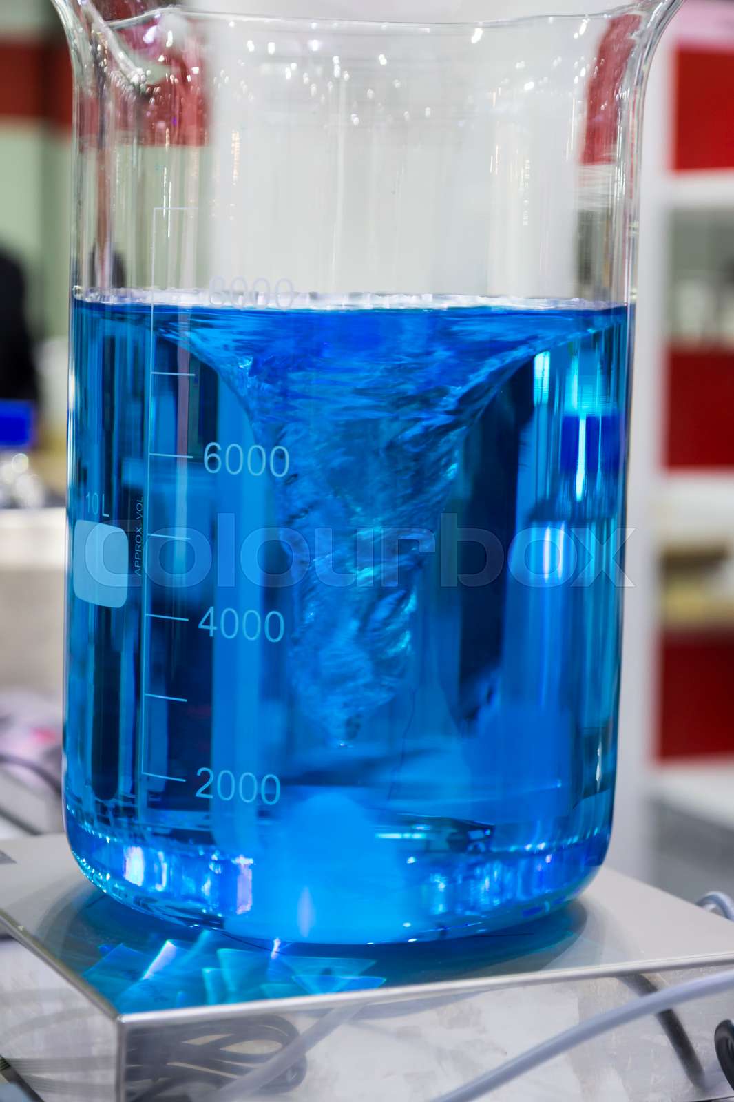 Beaker on magnetic stirrer | Stock image | Colourbox