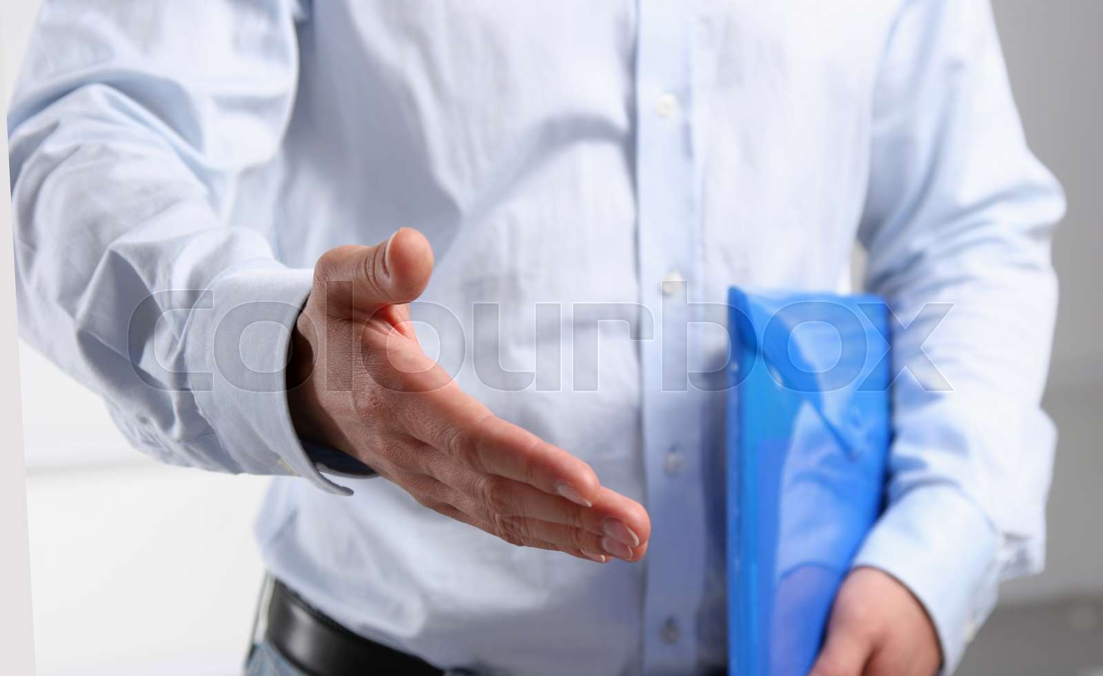 Businessman offering his hand for handshake | Stock image | Colourbox