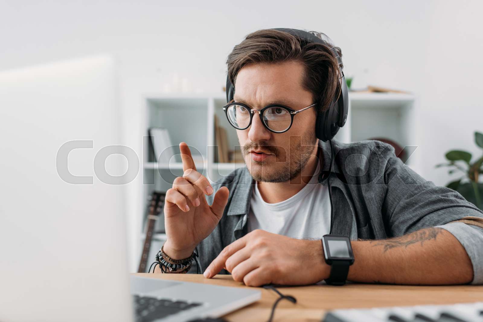 young musician listening music | Stock image | Colourbox