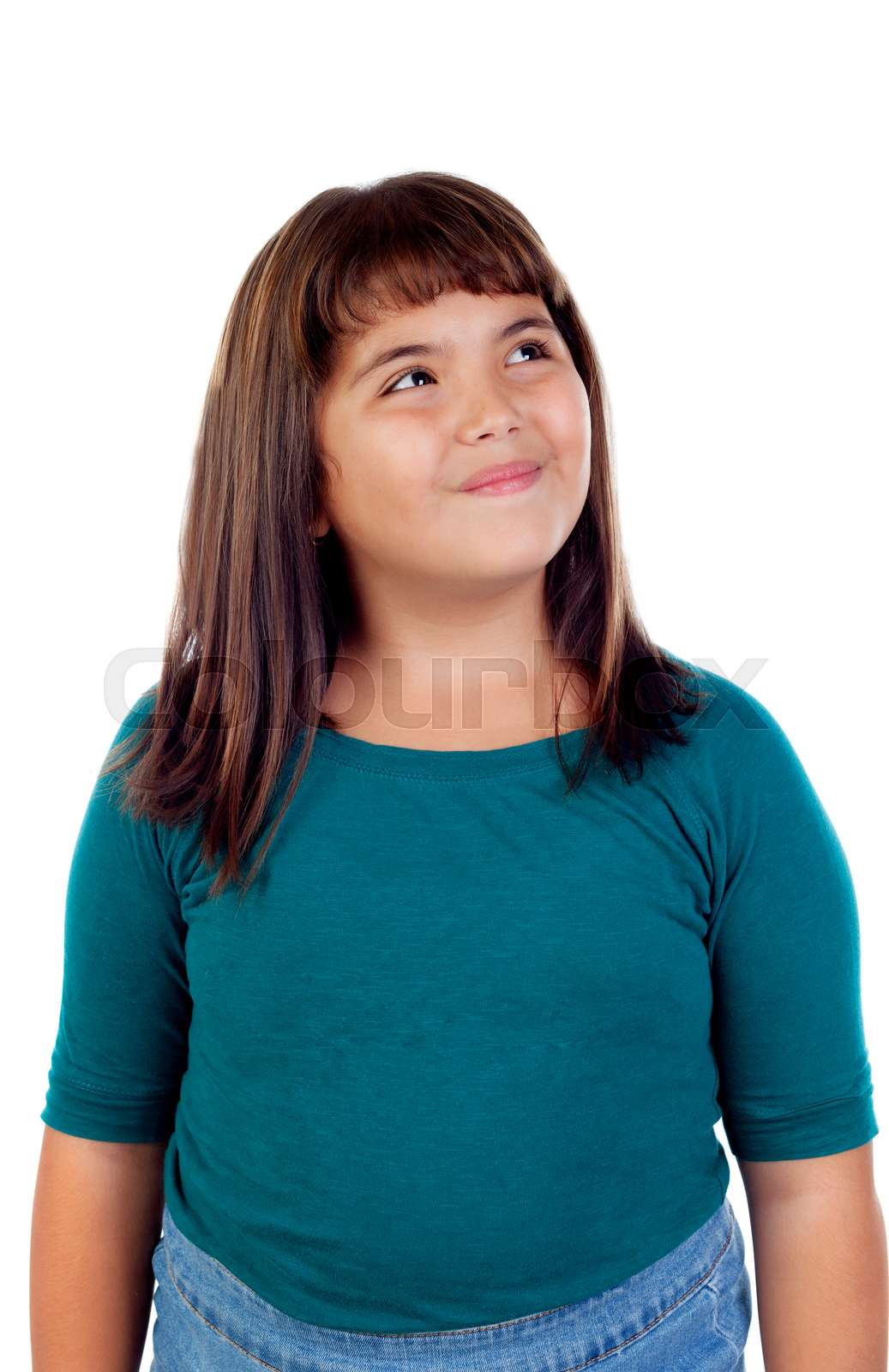 Adorable girl with eleven years old looking up | Stock image | Colourbox