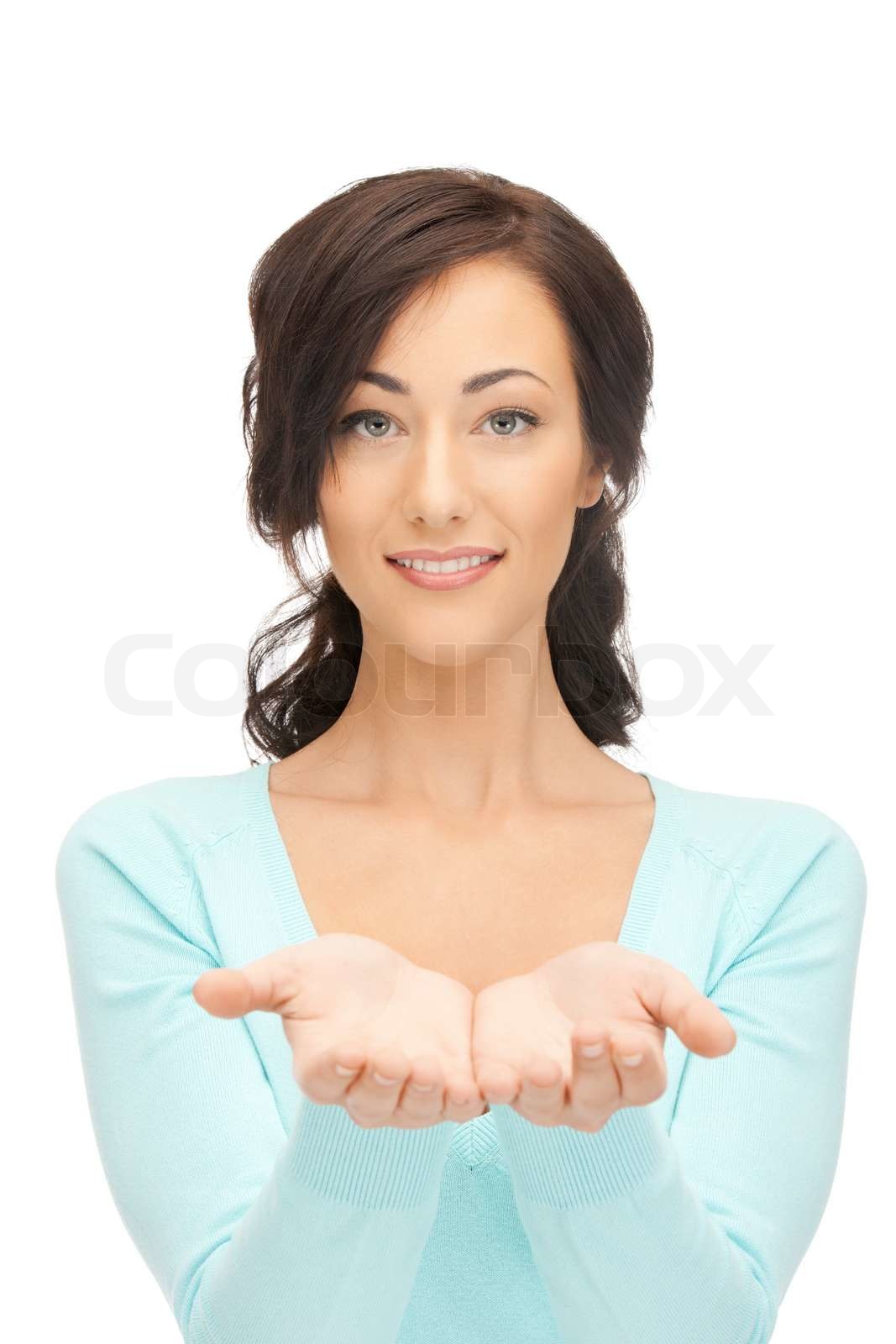 beautiful woman showing something on the palm of her hand | Stock image ...