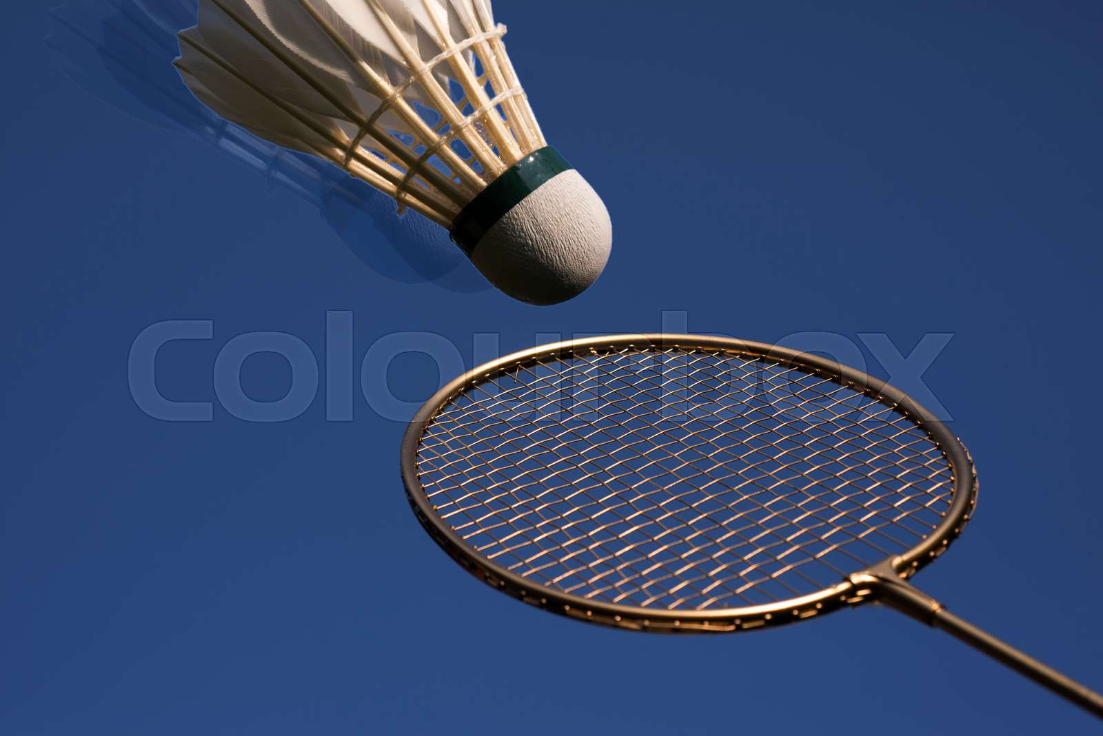 Badminton golden racket sky blue. | Stock image | Colourbox