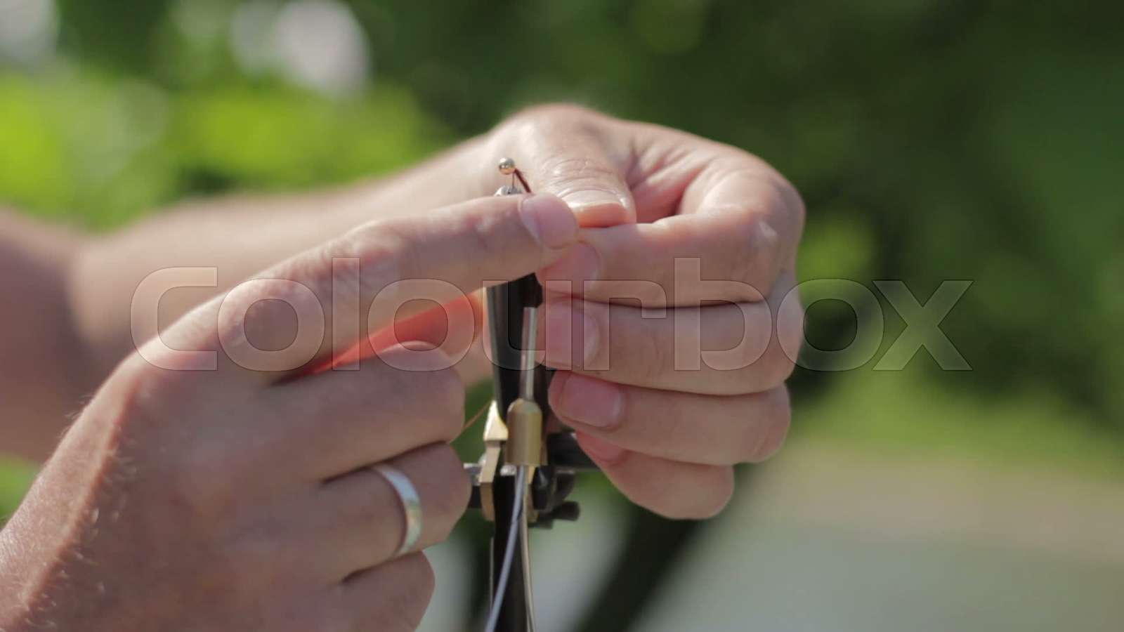 Flyfishing, flytying Salmon smolt pattern | Stock video | Colourbox