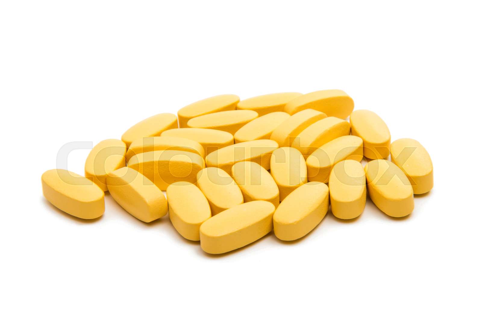 Yellow tablet pills isolated | Stock image | Colourbox