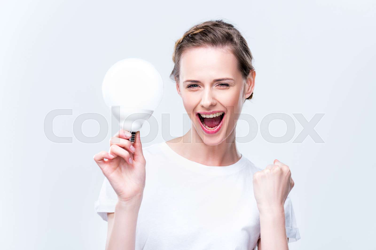 woman with light bulb | Stock image | Colourbox