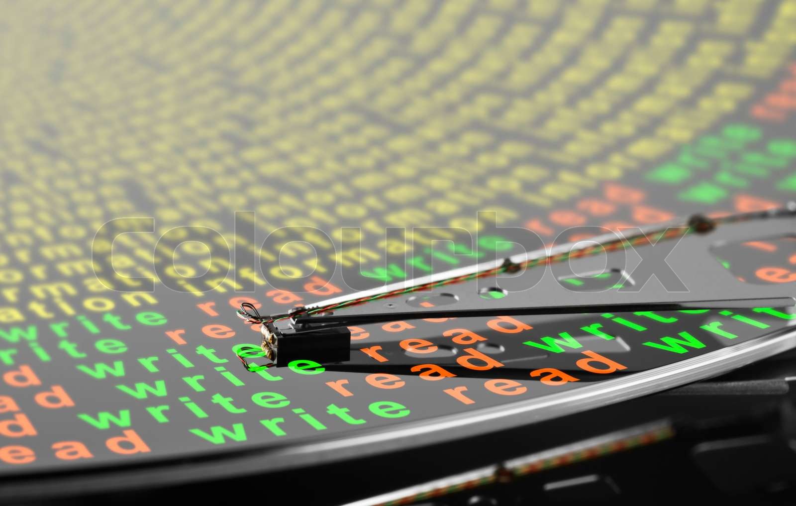 detail shot of a hard disk platter with actuator arm and symbolic read ...