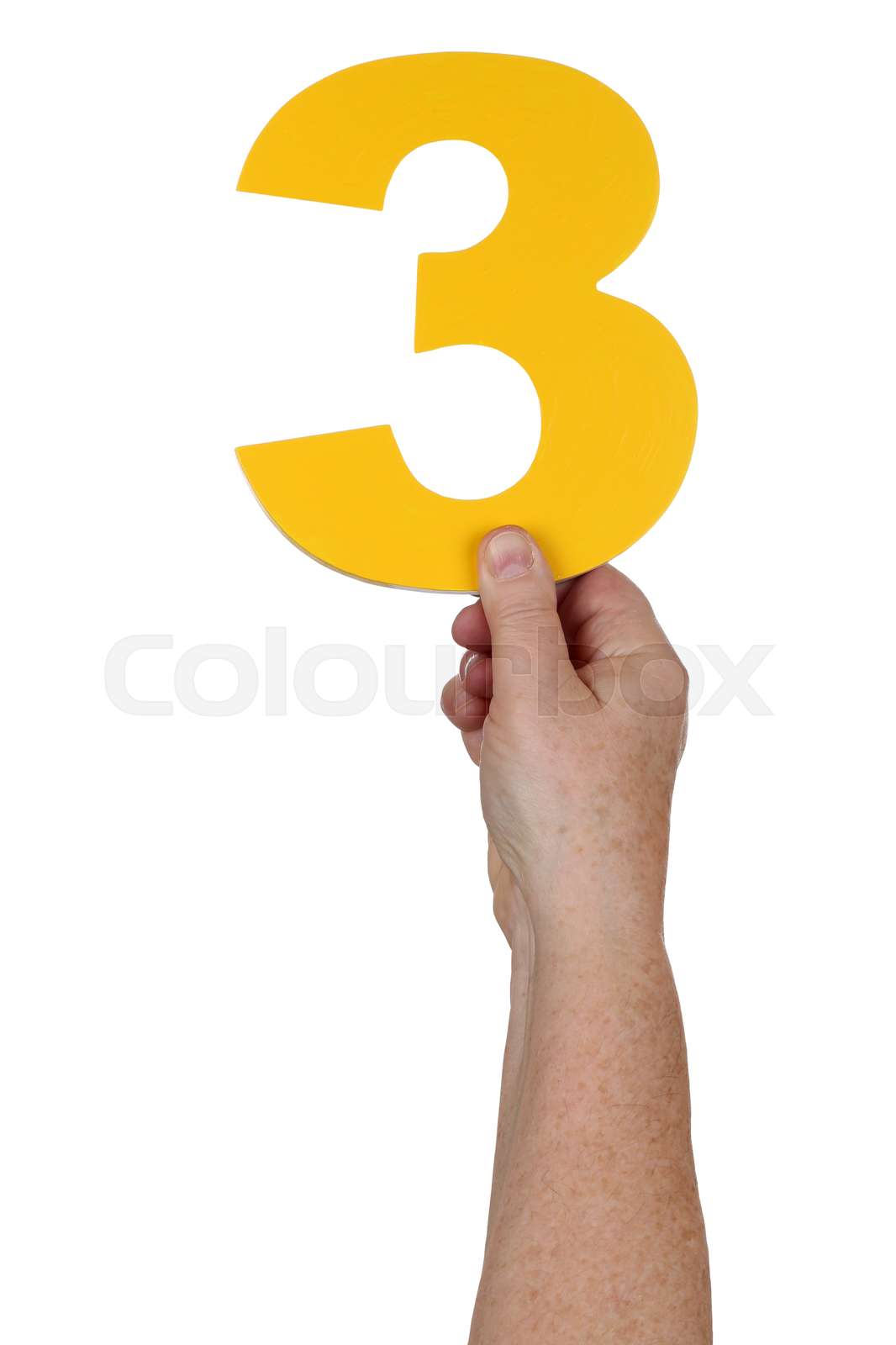 Hand holding number 3 | Stock image | Colourbox