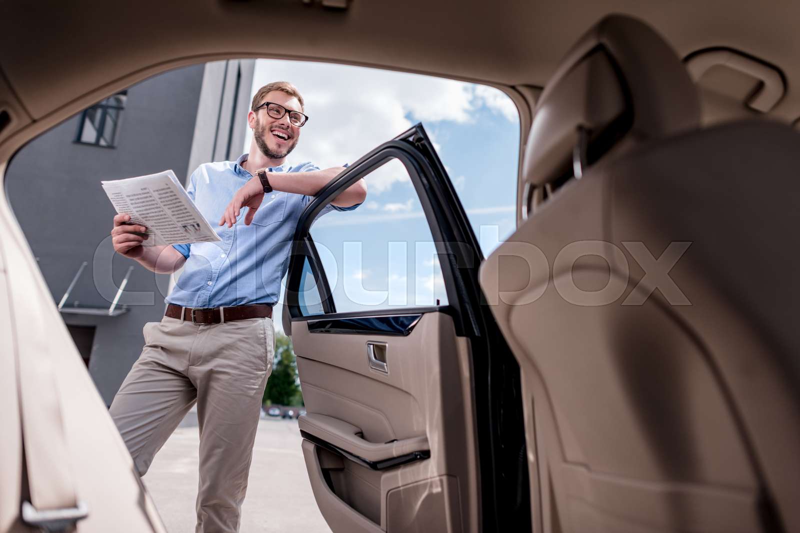 man standing near the car | Stock image | Colourbox