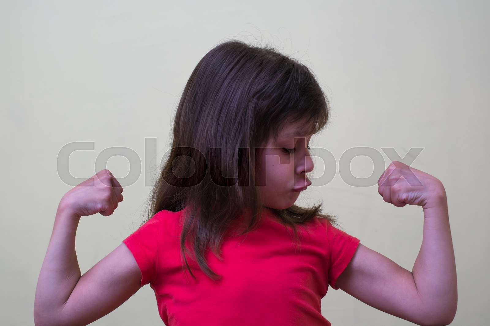 Girl child Muscles | Stock image | Colourbox