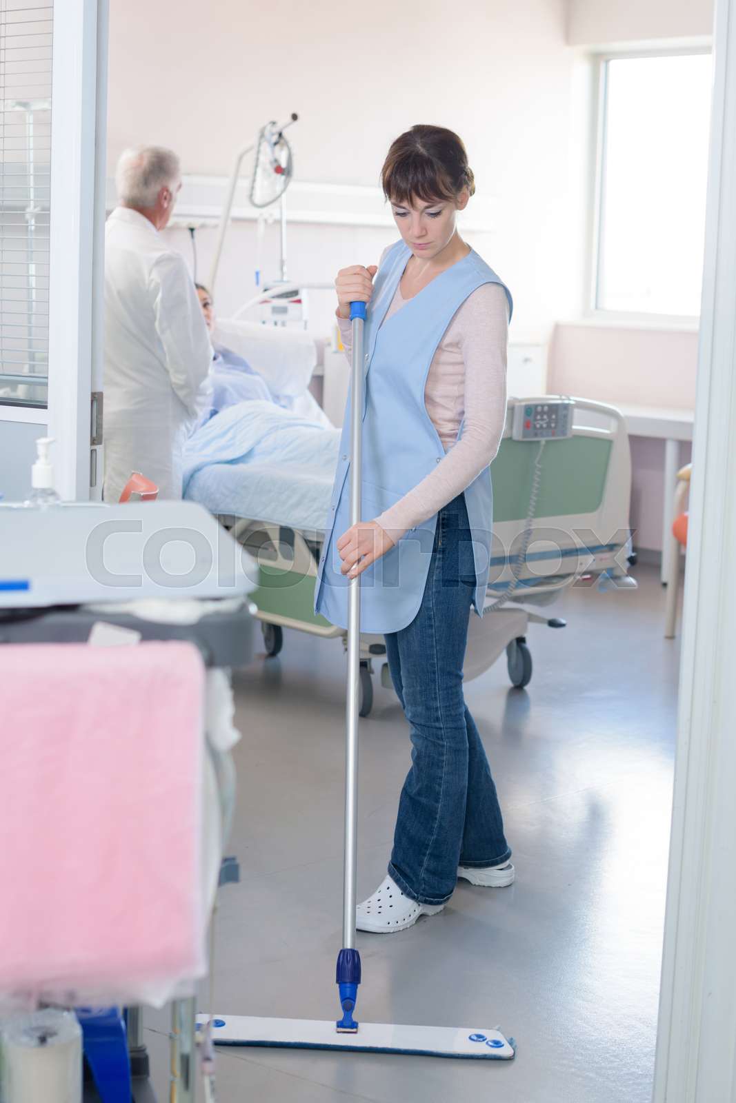 cleaning services with washing mop in a clean hospital | Stock image ...