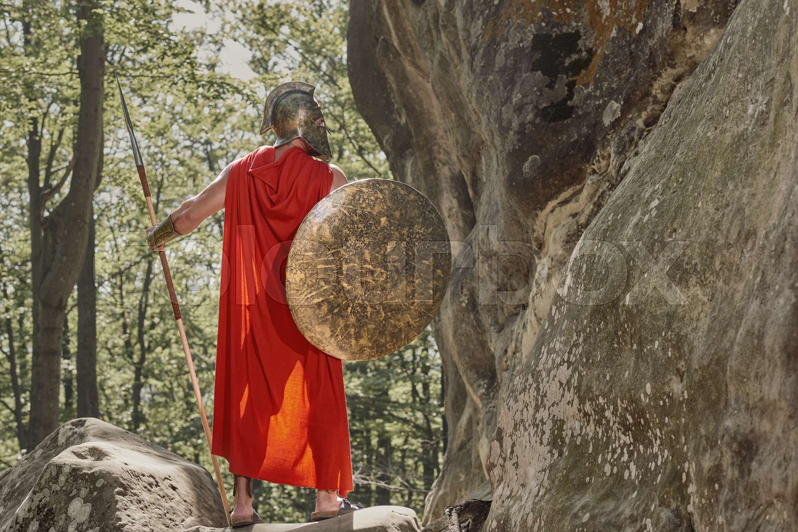 Strong man posing in warrior armor | Stock image | Colourbox