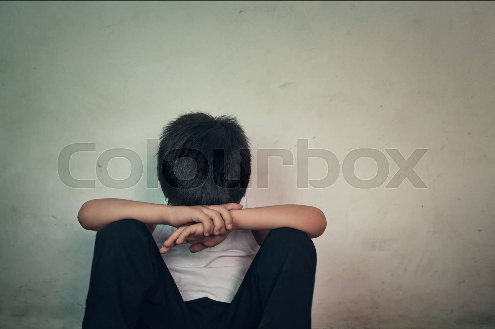 Poor and sad child | Stock image | Colourbox